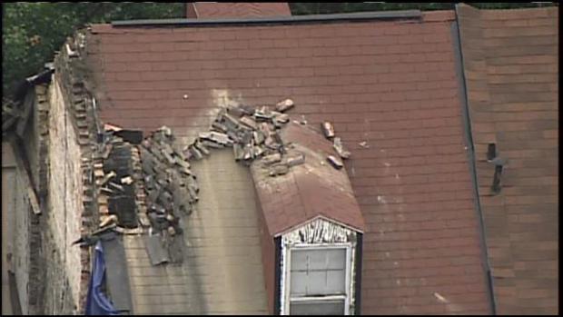 Man trapped up to chest in debris after building collapse | wusa9.com