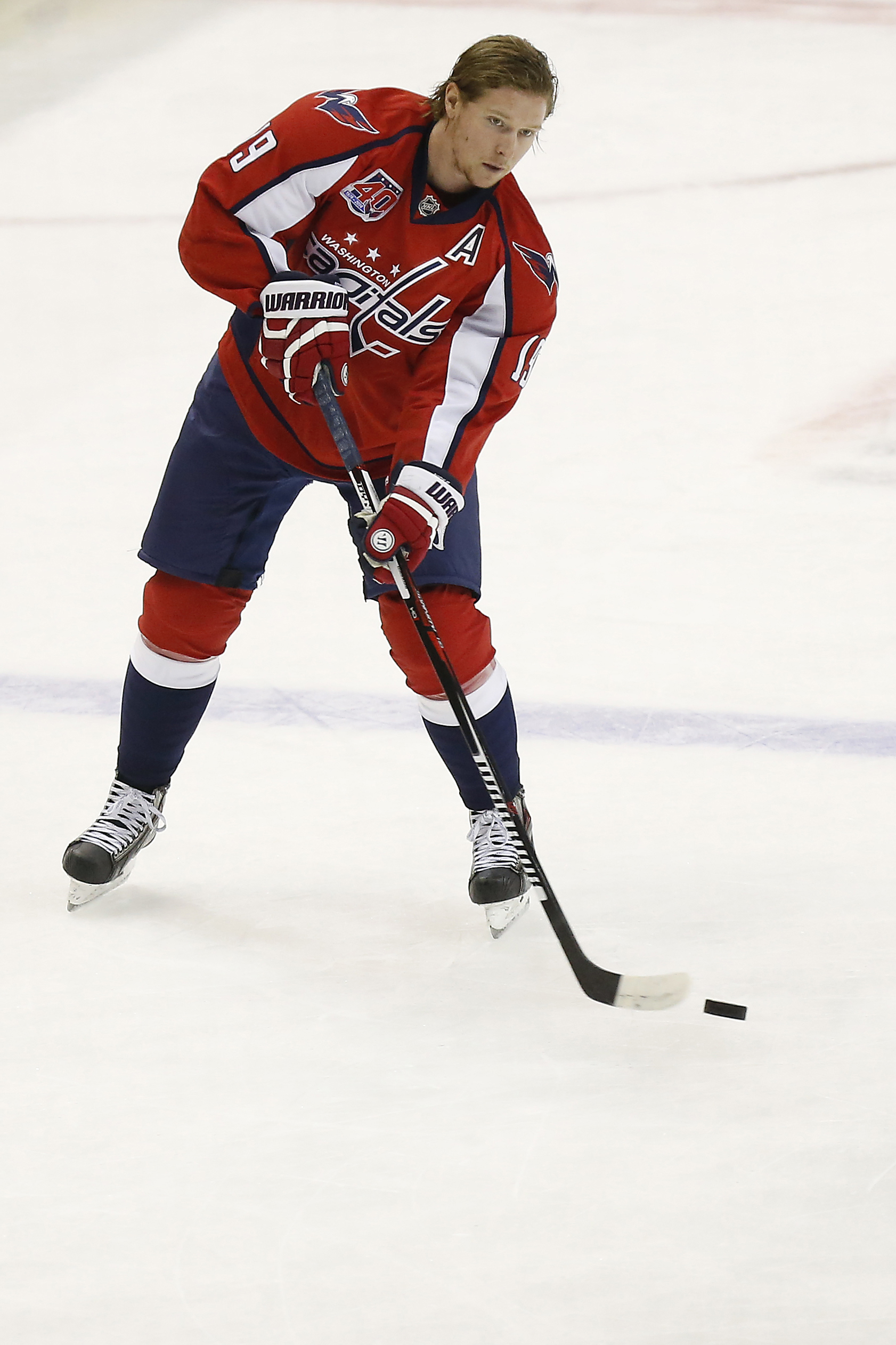 Backstrom debuts with 3 points as Caps beat Hurricanes | wusa9.com
