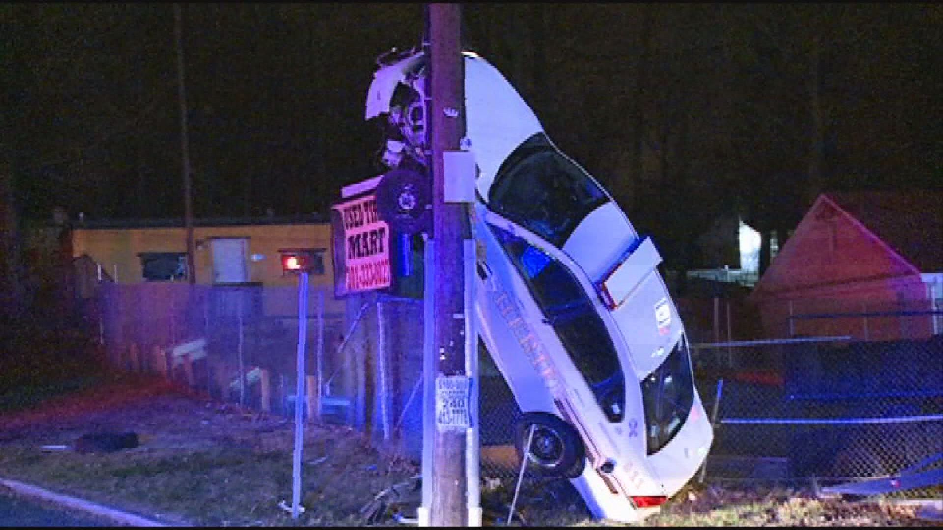 Police cruiser ends up on pole | wusa9.com