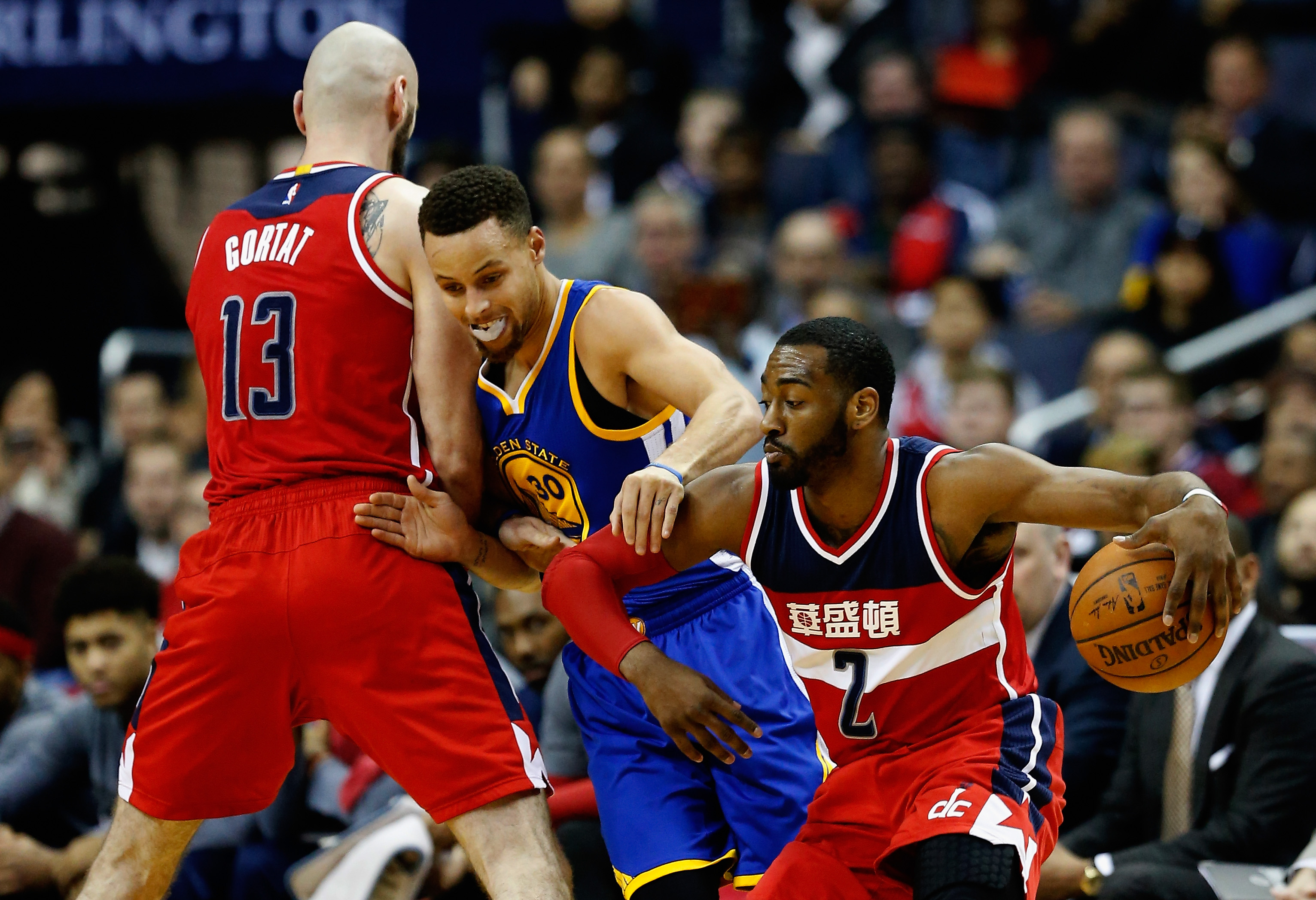 Watch the 'Polish Hammer' clear the way for John Wall | wusa9.com