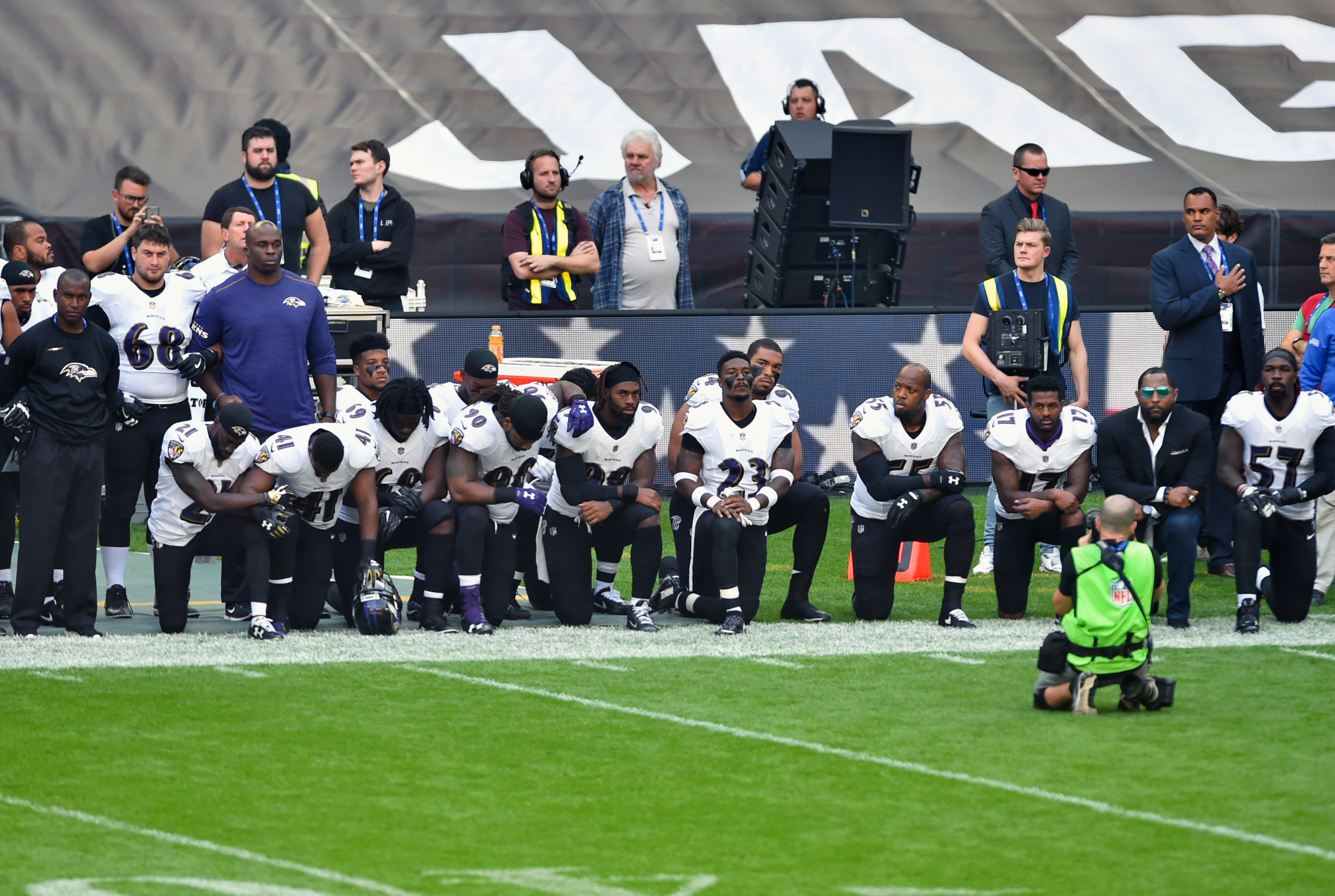 About two dozen players kneel for national anthem in London | wusa9.com